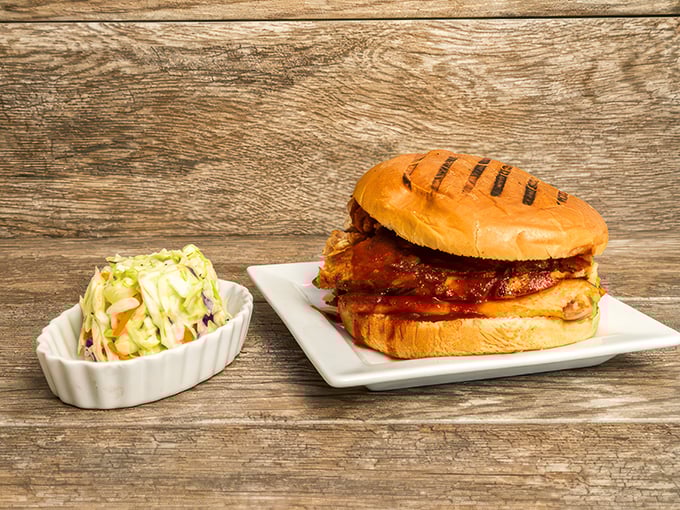 The chicken sandwich that crossed the road&hellip; to become a barbecue legend. Paired with creamy coleslaw, it's a match made in comfort food heaven.