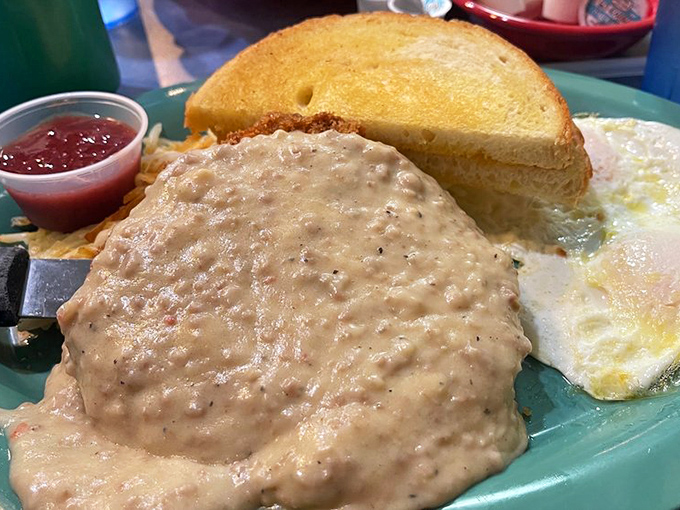 Chicken Fried Steak: where "diet" goes to die, and happiness begins. This plate is more smothered than a teenager's bedroom wall with band posters.