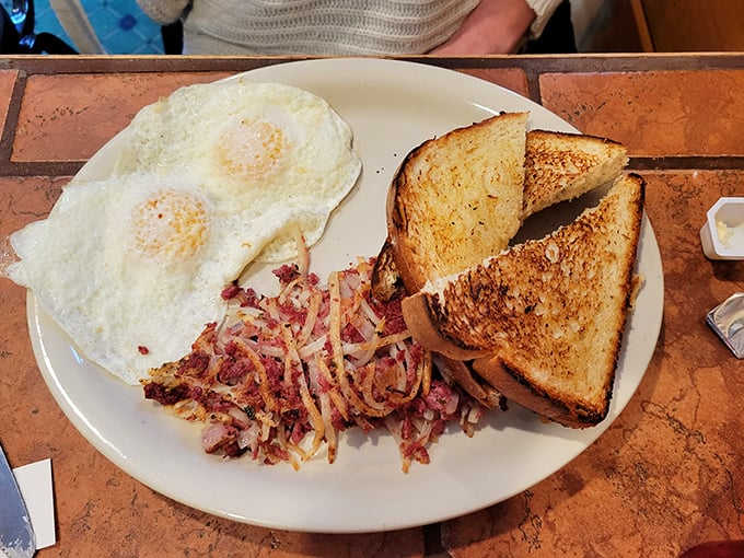 Corned beef hash: the breakfast that says, "I'm ready to conquer the day!" Or maybe just conquer a nap after this hearty plate.