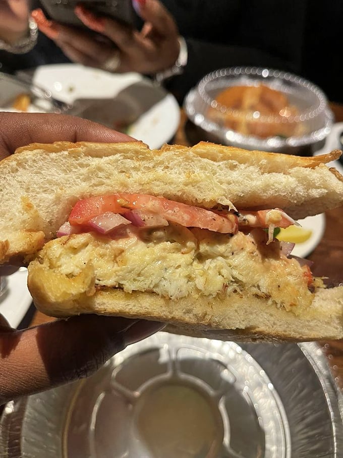 Crab cake perfection! This sandwich is so packed with sweet, succulent crab meat, it could make Poseidon himself trade in his trident for a fork.
