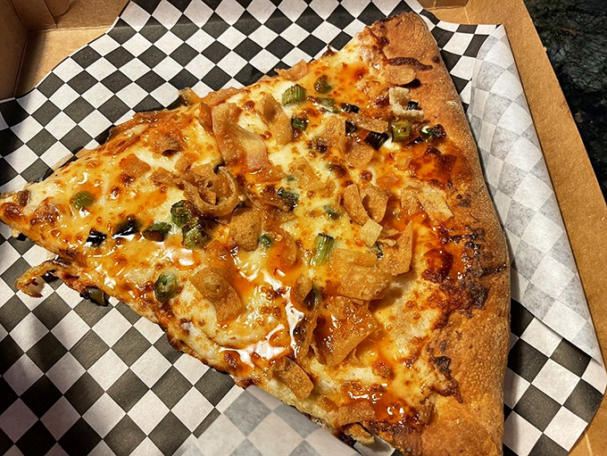 Holy seafood, Batman! This Crab Rangoon slice is the superhero crossover we never knew we needed &ndash; part New York, part Asian fusion, all delicious.