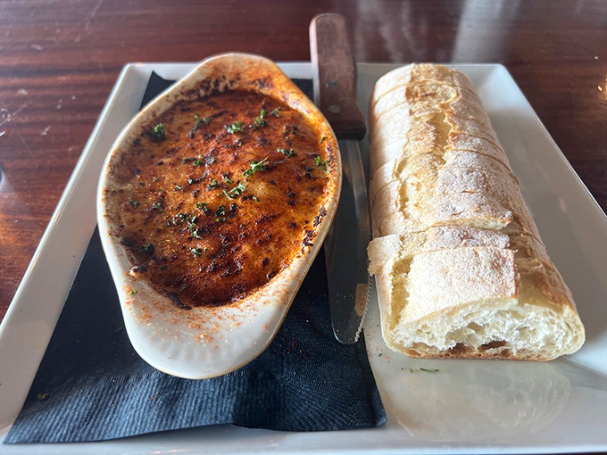 Crab dip so creamy, it could make a lobster jealous. Paired with crusty bread, it's a match made in seafood heaven.