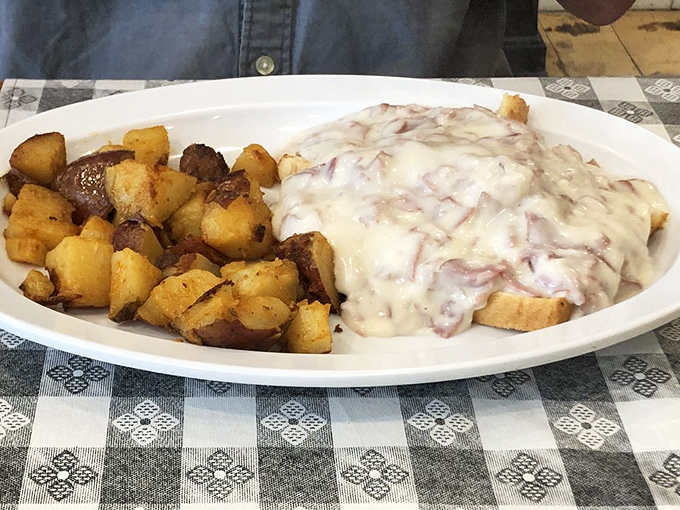 Cream chipped beef: The dish that launched a thousand food comas. Paired with those golden home fries, it's breakfast nirvana.