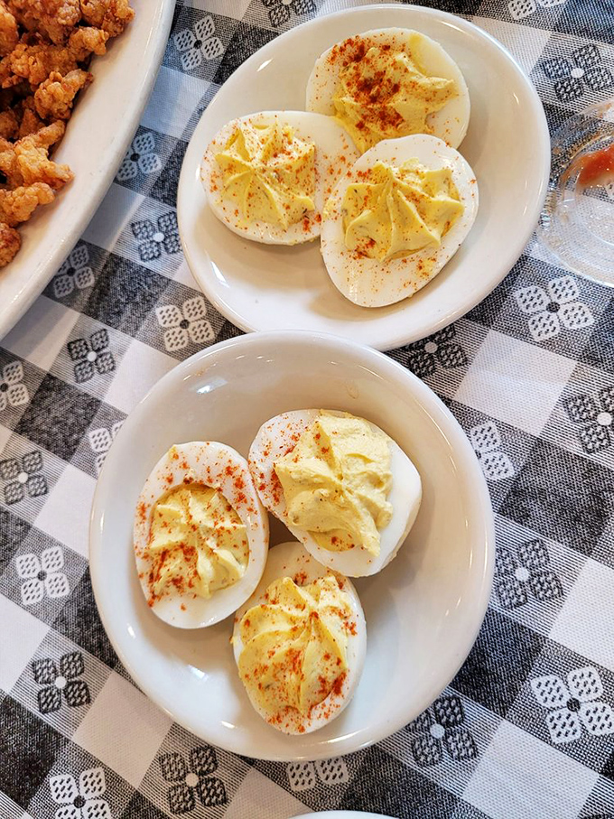 Deviled eggs sprinkled with paprika&mdash;a humble appetizer elevated to art form, proving simplicity is the ultimate sophistication.
