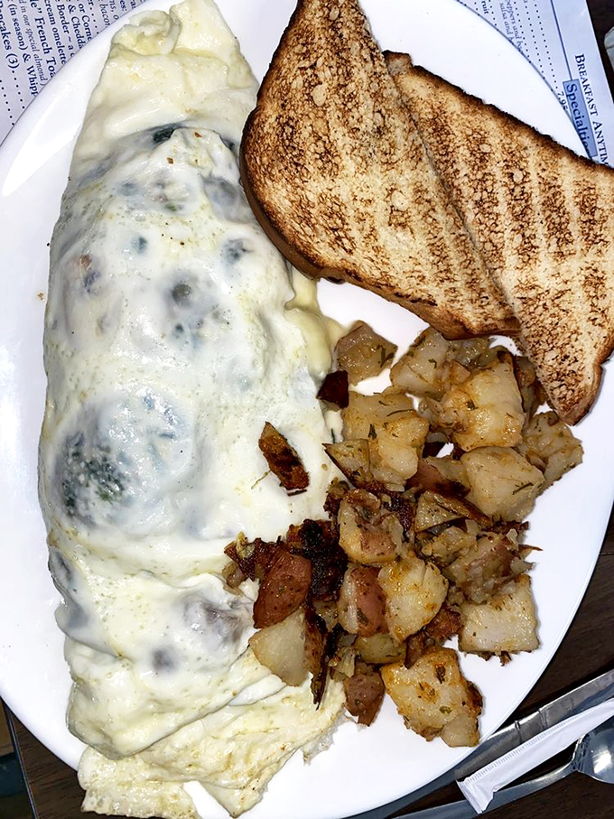 Who says healthy can't be heavenly? This egg white omelet is so packed with veggies, it's practically a garden on a plate. Your taste buds and your doctor will approve!