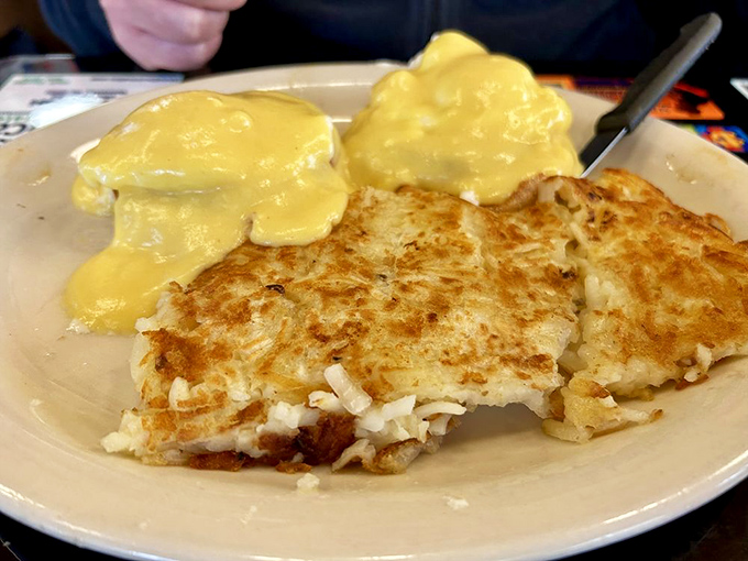 Golden hollandaise cascading over perfectly poached eggs and crispy hashbrowns. This Benedict doesn't need a last name to command respect.