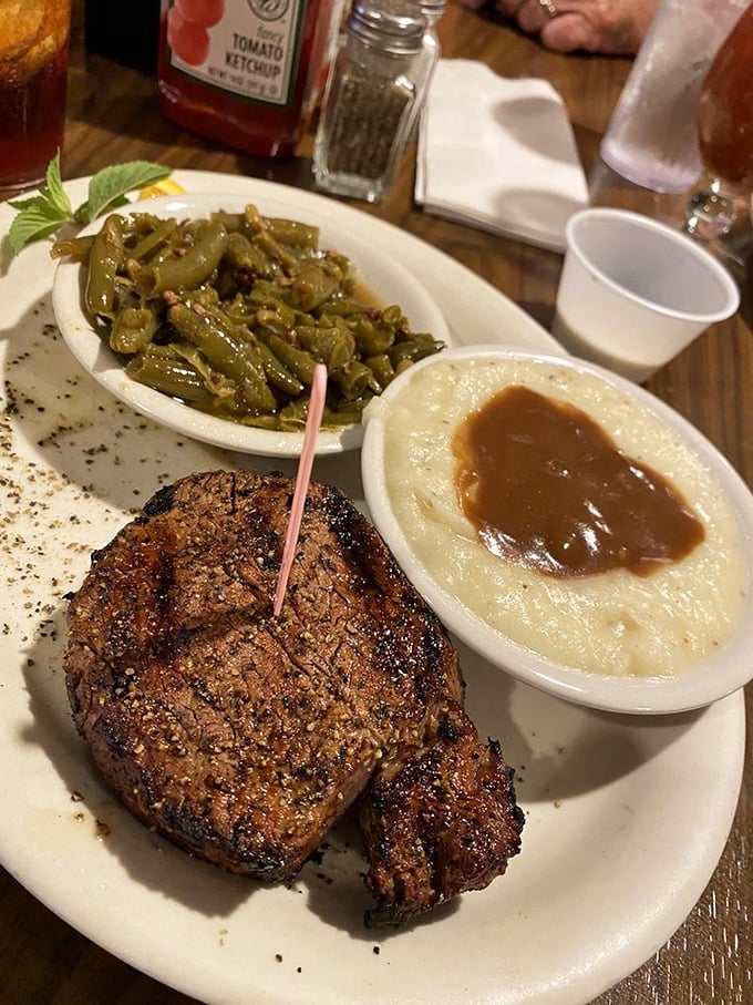 Filet mignon so tender, you could cut it with a spoon. Paired with those mushrooms? It's like a steakhouse symphony in your mouth.