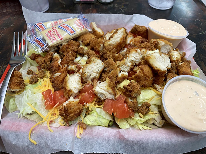 Fried chicken salad: Where Southern comfort food meets its leafy match. It's like a hug for your taste buds, with a side of guilt-free greens.