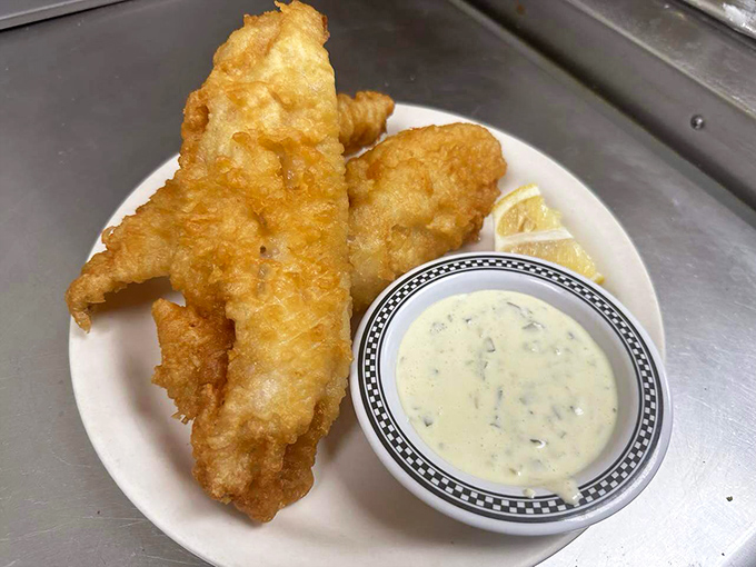 Forget walking on water – this fried walleye practically swims to your plate. A crispy catch that would make any fisherman proud.