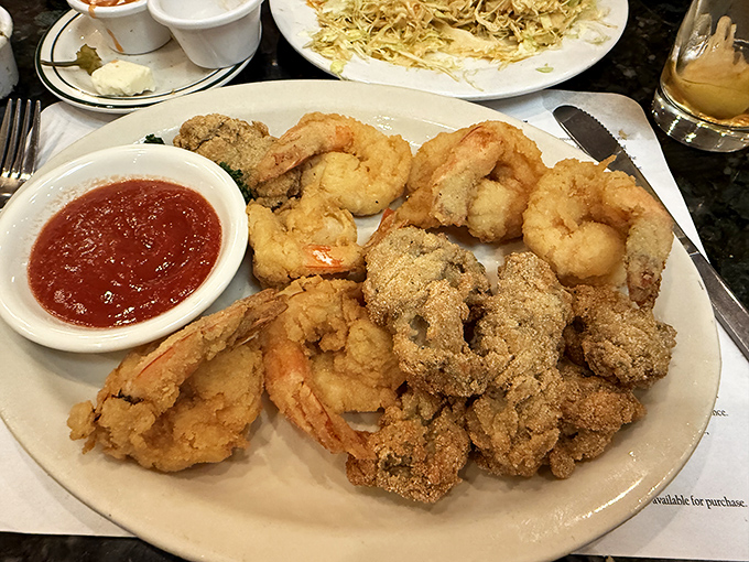 Golden treasures from the deep! These crispy fried oysters and shrimp are like edible jewels, each bite a little taste of seafood heaven.