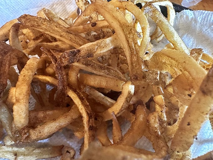 Curly fries: the rollercoaster of the potato world. These golden twists are a crispy, seasoned journey your mouth won't soon forget.