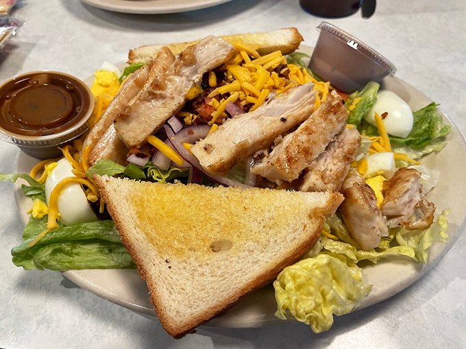 Who says salads can't be exciting? This grilled chicken number is dressed to impress, with more colors than Joseph's technicolor dreamcoat.