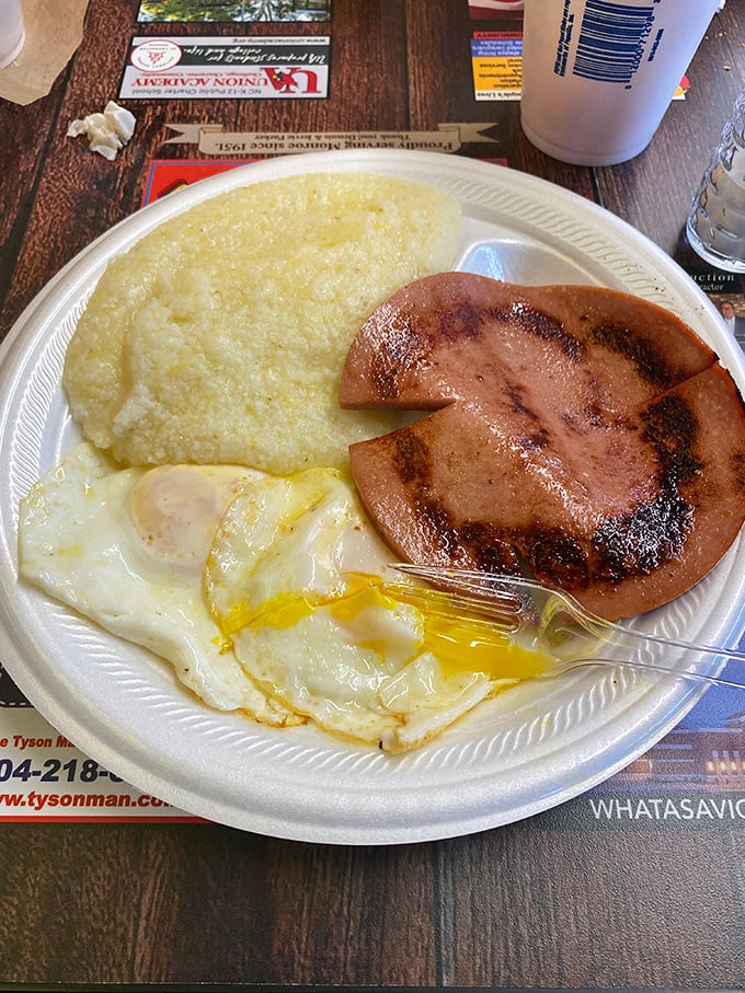 Grits, ham, and eggs: the holy trinity of Southern breakfast. It's like a warm hug for your stomach.