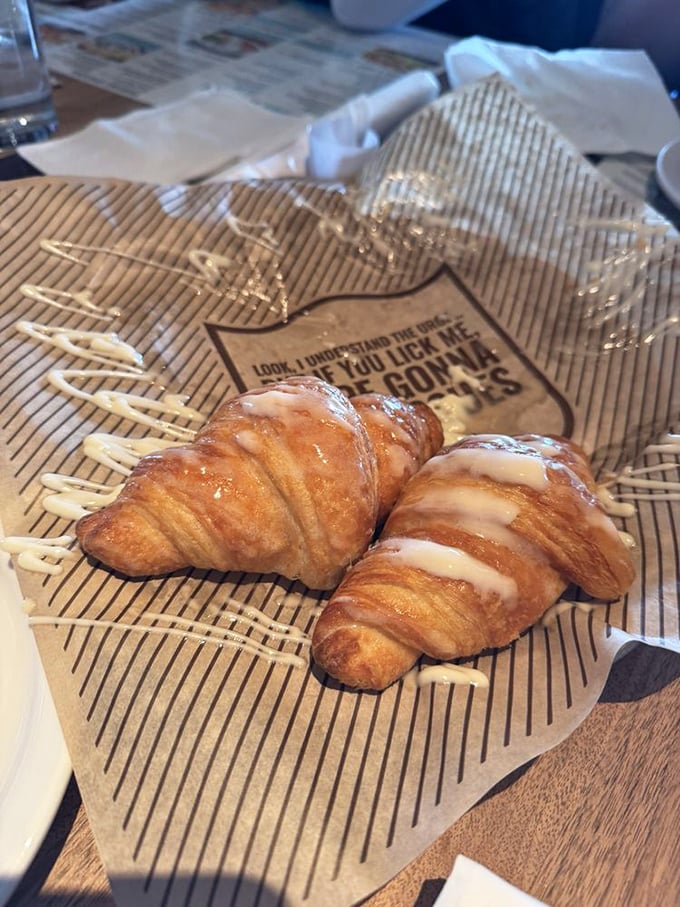 These honey butter croissants aren't just bread service; they're buttery time machines transporting you back to grandma's kitchen.