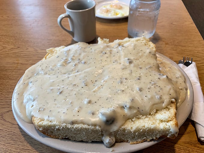 Holy mother of carbs! This biscuits and gravy platter is big enough to have its own zip code. Fork not included &ndash; you might need a shovel.