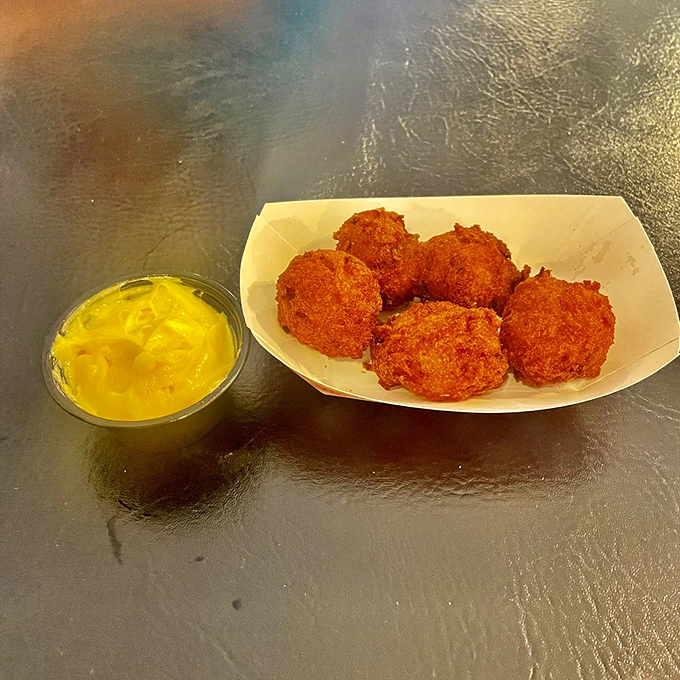 Golden orbs of deep-fried heaven! These hush puppies are so good, they'll have you barking for more.
