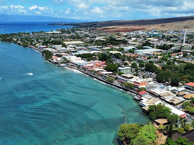 Bird's eye bliss! Lahaina's coastline is a perfect blend of azure waters and charming architecture &ndash; Mother Nature's own masterpiece.