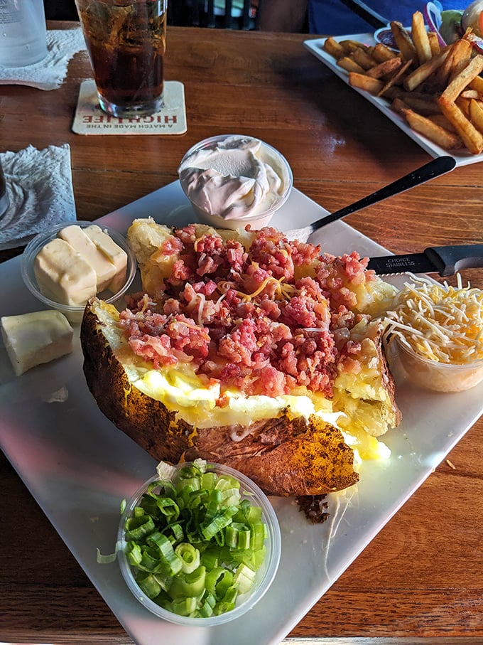 Loaded baked potato or edible work of art? This spud's a flavor explosion that would make Mr. Potato Head jealous of its accessories.