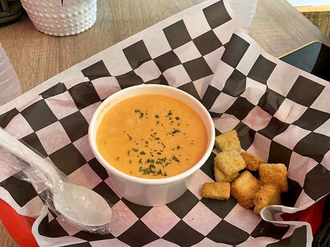 Lobster Bisque: liquid gold in a bowl. So rich and creamy, you'll want to dive in like Scrooge McDuck in his money bin.