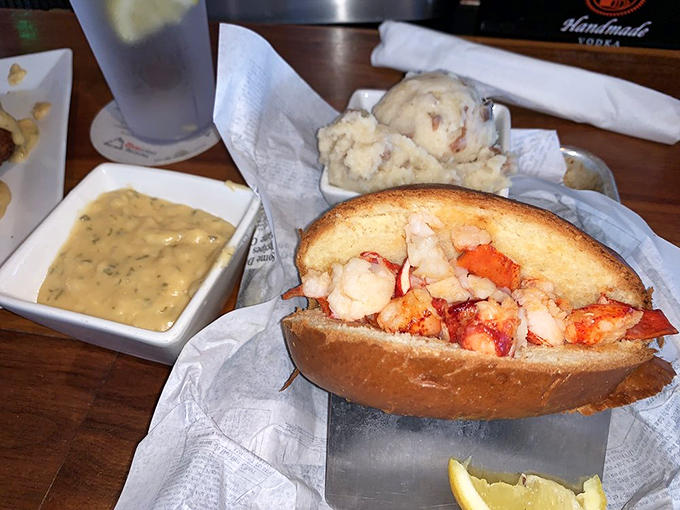 The lobster roll that launched a thousand ships. Buttery, overflowing, and ready to set sail straight to your taste buds.