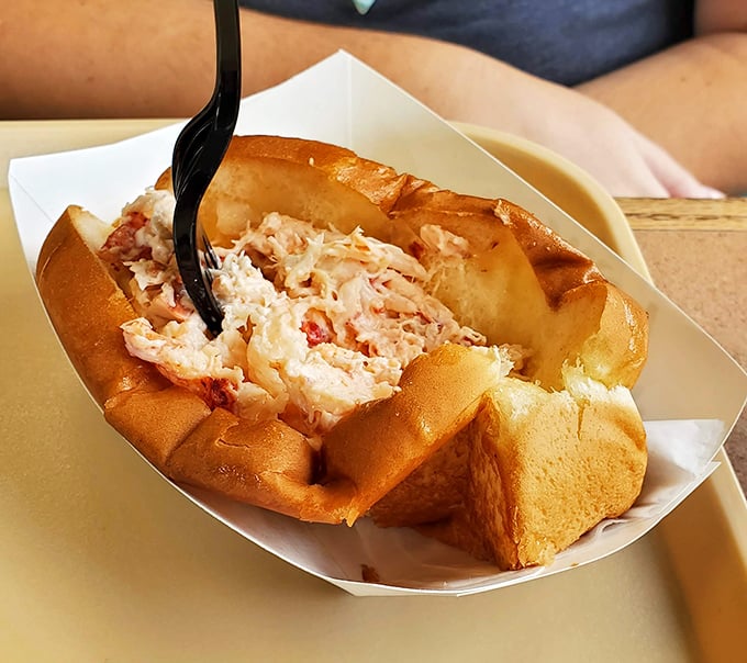 This lobster roll isn't just a sandwich, it's a work of art. Van Gogh would've painted it if he'd been a foodie.
