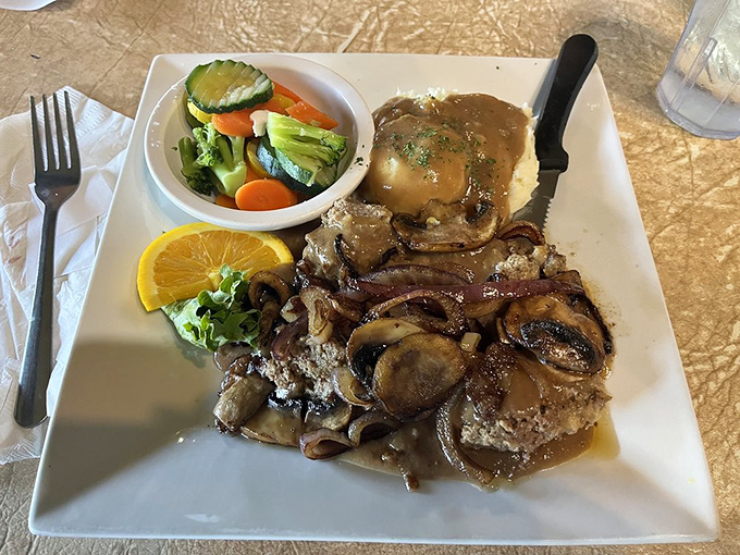 Who knew heaven could fit on a plate? This hearty meatloaf dinner is like a warm hug from your favorite aunt.