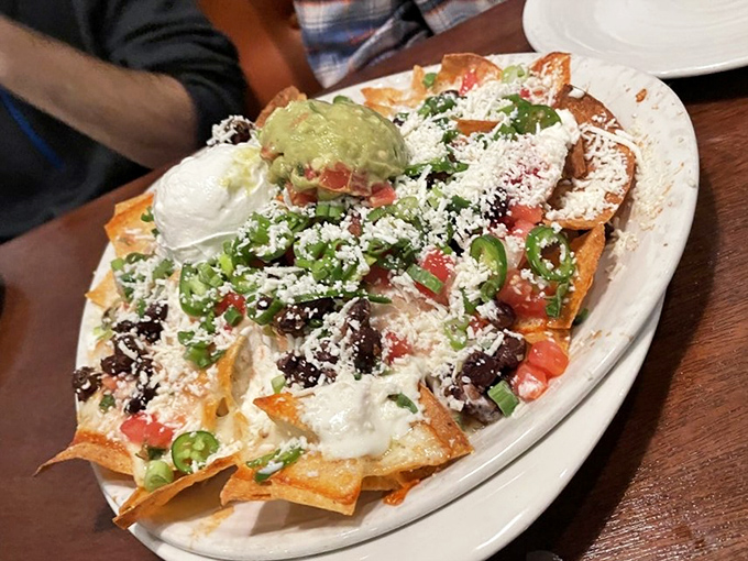 These aren't your college dorm nachos&mdash;they're a colorful fiesta with every chip fighting to be the most generously topped. Democracy in appetizer form.