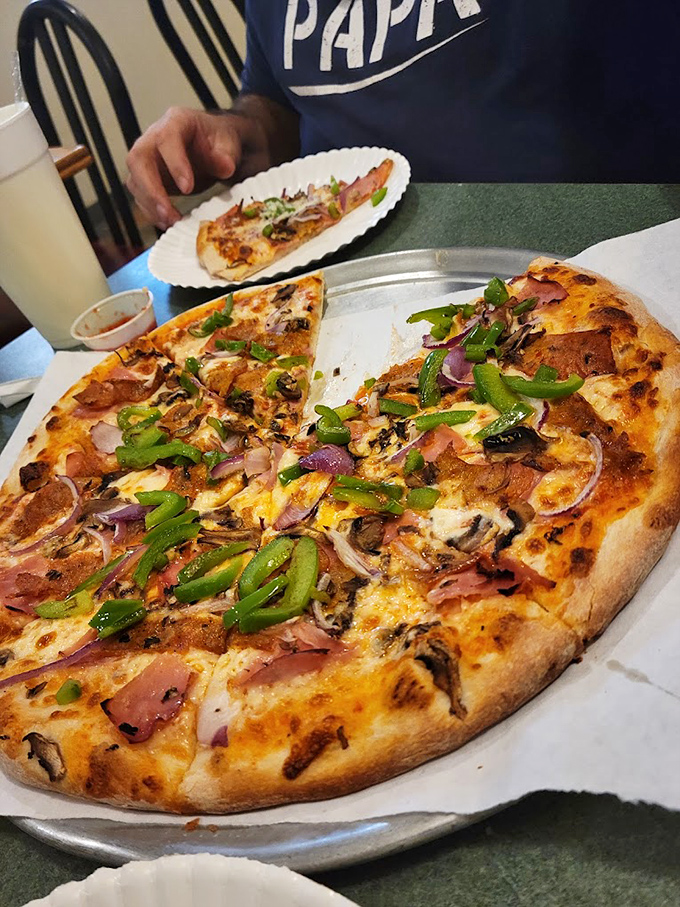 Talk about a loaded pizza! This New York-style beauty has more toppings than a Kardashian has Instagram followers.