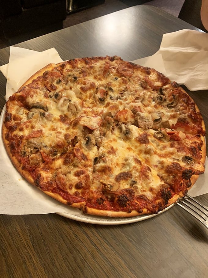 The Palace Special: where meat lovers' dreams and vegetable enthusiasts' fantasies collide in cheesy harmony.