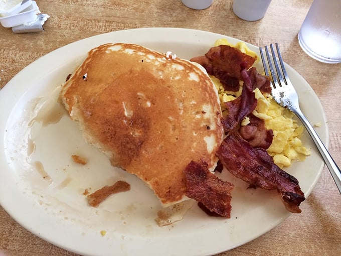Pancakes so fluffy, they might float away if not anchored down by crispy bacon. A breakfast worth waking up for!