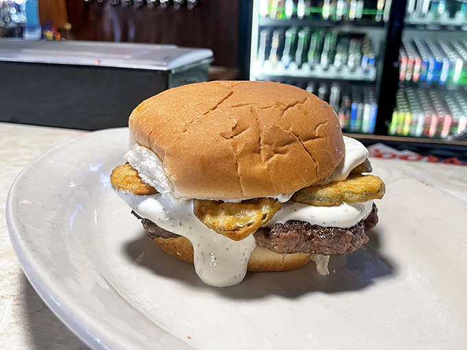 Pickle lovers, rejoice! This burger's got more tang than a 1970s disco party. It's a dill-lightful twist on an American classic.