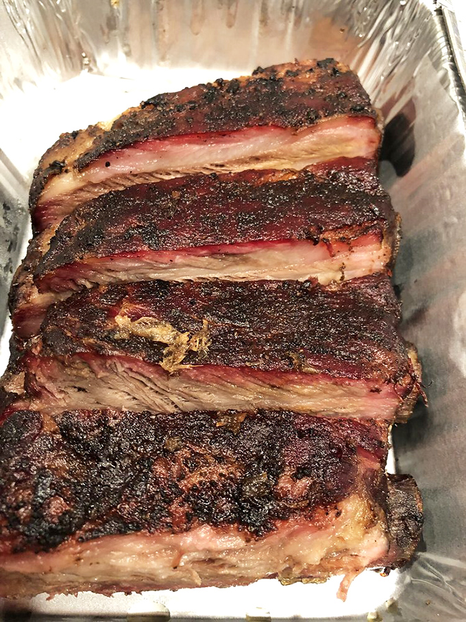 These ribs aren't just fall-off-the-bone tender; they're practically doing the cha-cha slide off the plate.