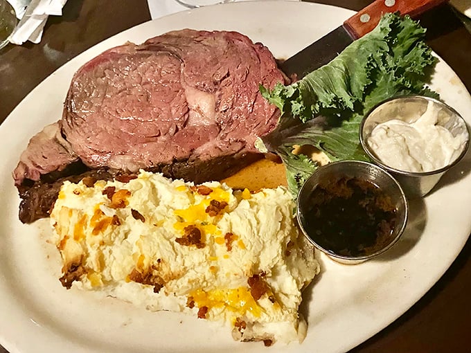 Talk about a dynamic duo! This prime rib and loaded baked potato combo is like Batman and Robin, if Batman were deliciously medium-rare and Robin were cheesy and bacon-topped.