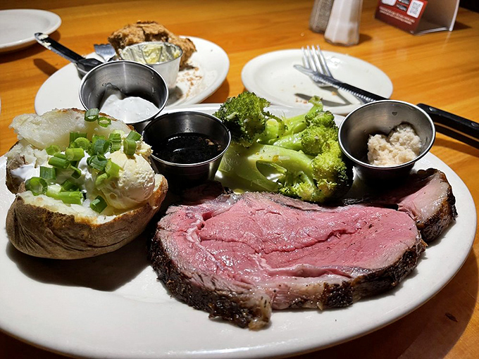 A symphony of flavors on one plate: tender prime rib taking center stage while supporting players like green beans and mac & cheese round out the ensemble.