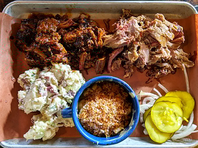 Those bright pickles aren't just garnish&mdash;they're little acid bombs strategically deployed to cut through the richness of that gloriously shredded pork.