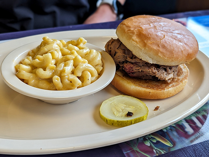 The dynamic duo: pulled pork and mac and cheese. It's like the Batman and Robin of comfort food, but tastier.