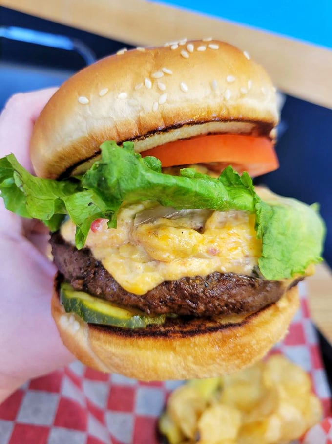 Behold, the burger that launched a thousand napkins. It's not just a meal; it's an adventure between two buns.