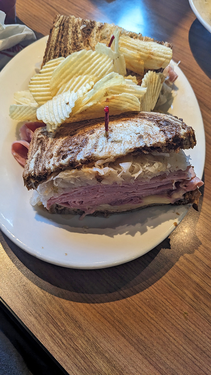 The dynamic duo: A perfect Reuben and its crispy sidekick. Name a more iconic pair, I'll wait.