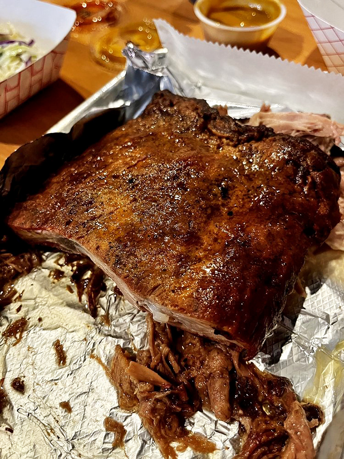 Behold, the BBQ motherload! This rack of ribs is so tender, it's practically falling off the bone just from the weight of your gaze.