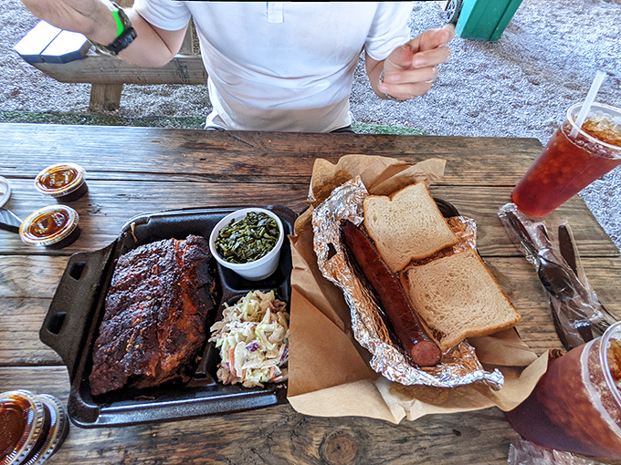 Ribs and sausage: the dynamic duo of barbecue. These bad boys look so good, they'd make a vegetarian consider a career change.
