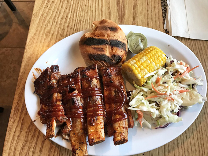 A perfect harmony of smoky and savory. This plate is like a greatest hits album for your taste buds, featuring chart-toppers like ribs, corn, and coleslaw.