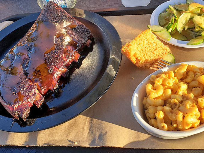 A symphony of savory! This platter hits all the right notes, from smoky ribs to creamy mac and cheese.