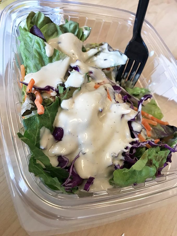 Even leafy greens get the VIP treatment here. This salad's so fresh, it might just make you forget you came for the mac.