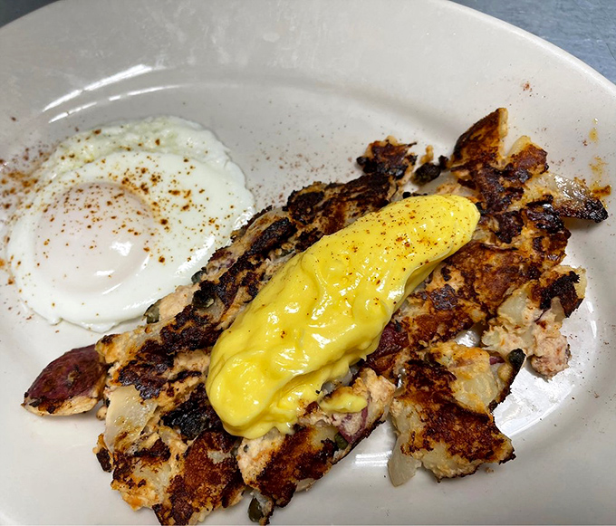 Salmon hash that's dressed to impress! It's like a fancy deconstructed lox bagel decided to crash the breakfast party.