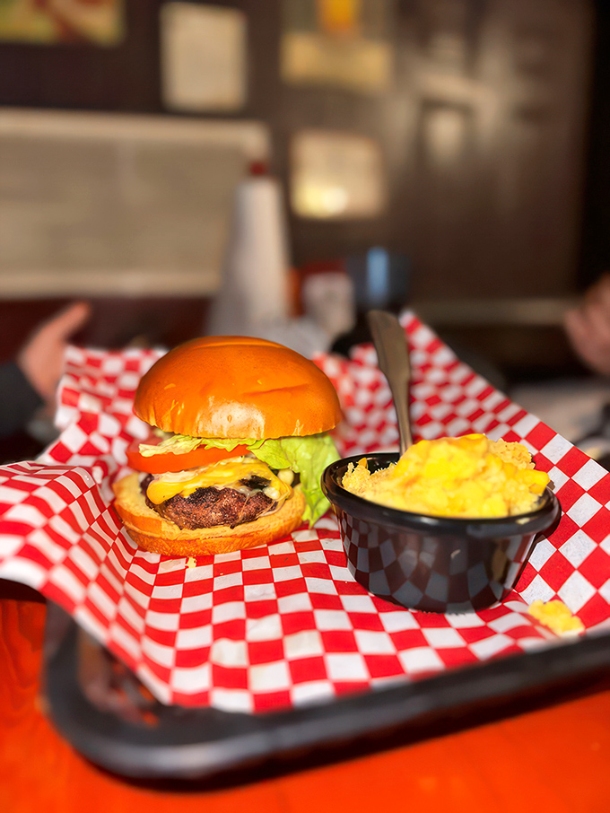 Burger nirvana achieved! This juicy masterpiece is stacked higher than your grandpa's stories about walking uphill both ways to school.