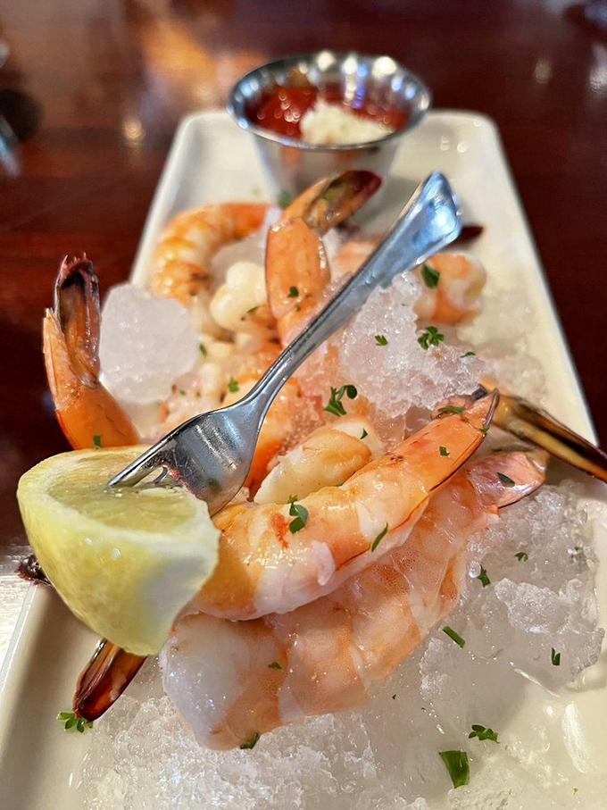 Shrimp cocktail or edible jewelry? These plump beauties, nestled on a bed of ice, are giving off some serious "treat yourself" vibes.