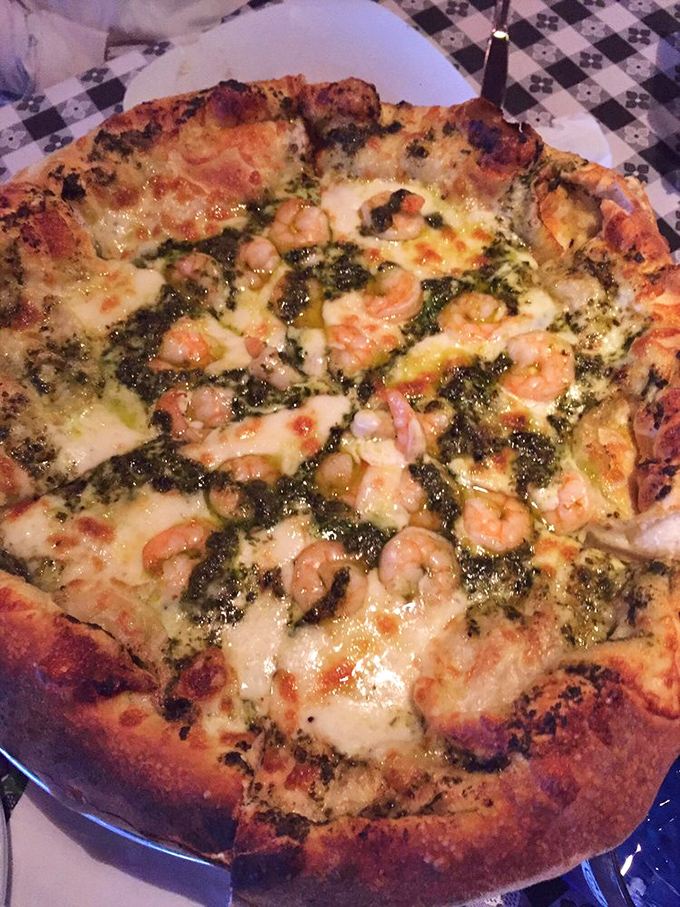 Surf meets turf on a pizza! This shrimp and pesto masterpiece proves that sometimes the most unexpected combinations are the most delicious.