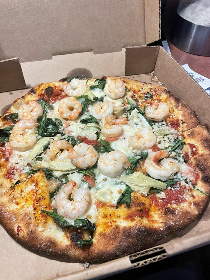 Shrimp Pizza: Ocean meets oven in this coastal delight. It's like a beach vacation for your mouth, minus the sand in your shorts.