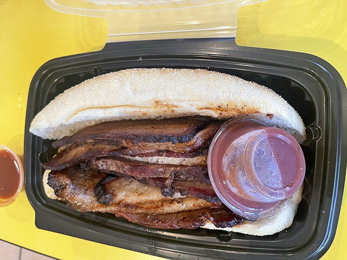 Brisket bliss in a bun! This sandwich is like a meaty magic carpet ride, transporting you to a world of smoky, beefy perfection.