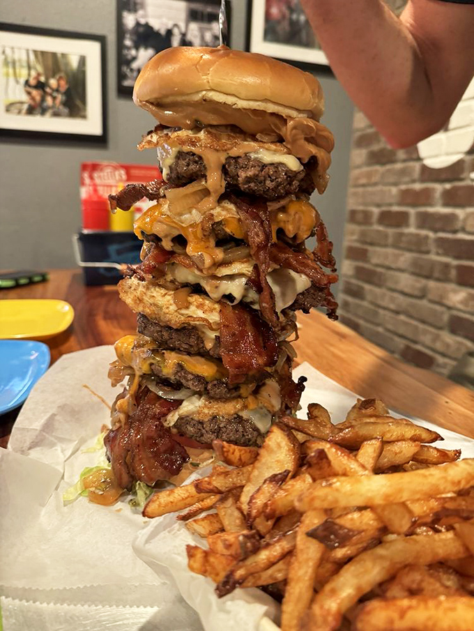 Ladies and gentlemen, I give you the Stellanator! This towering inferno of beef and toppings isn't just a burger; it's an edible skyscraper of deliciousness.